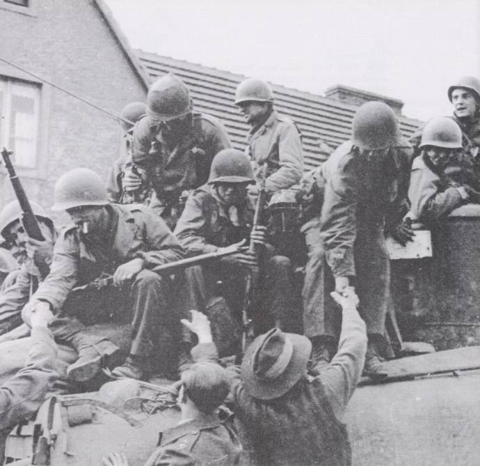 Prisoners greet their American liberators